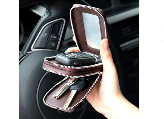 China Leather multi-function key chain trend car bag male small key storage bags supplier