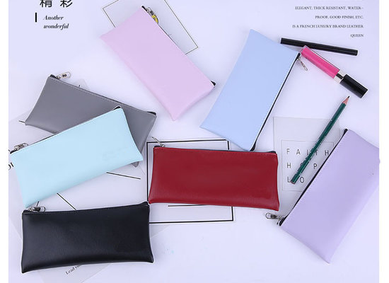 Plain color student pen bag female simple large capacity PU handbag makeup bag supplier