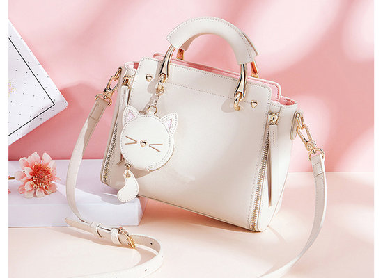 The new high-volume PU leather tote one-shouldered cross-slung custom logo women's handbag with strap supplier