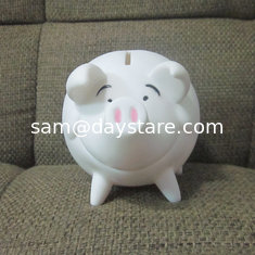 China Happy cartoon pig pvc piggy bank, rubber money box promotional toys for kids supplier