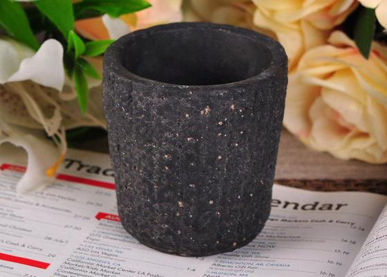 Spraying ceramic votive candle holders / Hand Made black candle holders