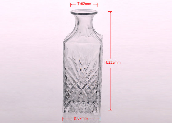 Superior embossed clear Glass Wine Bottles with cork lid , Machine made