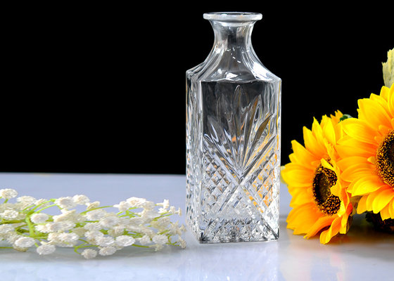 Superior embossed clear Glass Wine Bottles with cork lid , Machine made