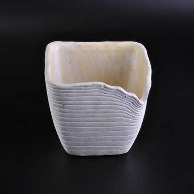 White ceramic candle vessel with glazing finish