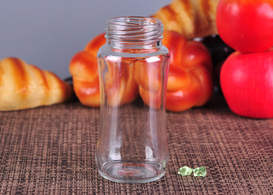 Eco - friendly transparent glass milk bottle for baby , glass infant bottles
