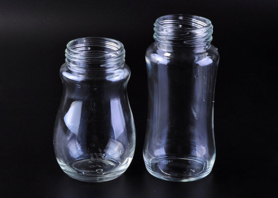 Eco - friendly transparent glass milk bottle for baby , glass infant bottles