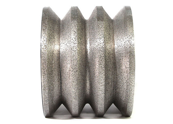Sintered diamond rotary dressing wheel with muti groove