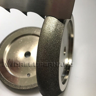 CBN grinding wheels for band saw blades. Wheel is profiled to match band saw teeth. Used correctly lasts very long