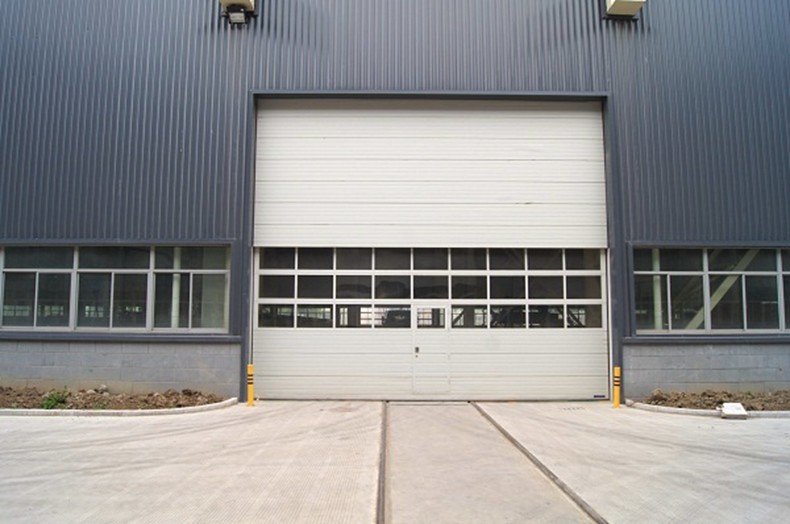 Automatic garage door opener/sectional garage door for home and commercial use