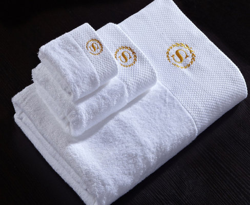 Wholesale custom jacquard logo100% cotton terry face towels for hotel