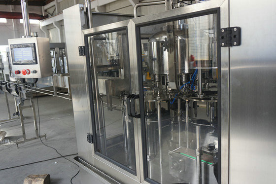 Machine de remplissage de bouteilles en verre/ANIMAL FAMILIER pour l'huile de tournesol, huile d'olive, huile lubrifiante 10000 BPH