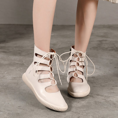 S146 Factory new fashion trend leather lace-up hollow cool boots ethnic style retro handmade Guangzhou spring and summer
