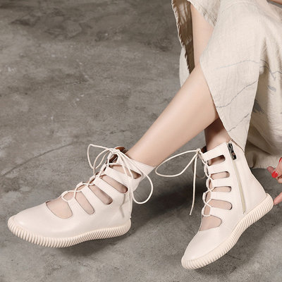 S146 Factory new fashion trend leather lace-up hollow cool boots ethnic style retro handmade Guangzhou spring and summer