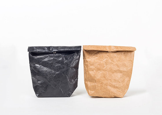 Brown paper tyvek bags with snap closure and buckle closure for shopper