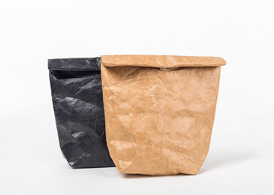 Brown paper tyvek bags with snap closure and buckle closure for shopper