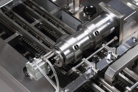Double lane biscuit sandwiching machine with row multiplier