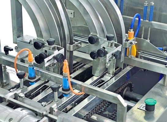 Double lane biscuit sandwiching machine with row multiplier