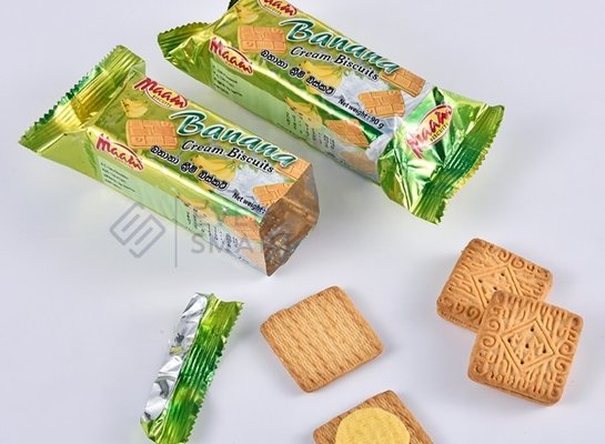 Four lane biscuit sandwiching machine with row multiplier