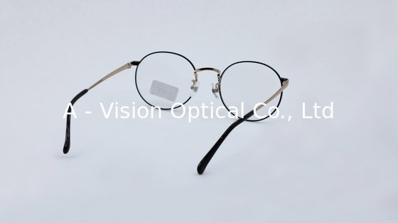 Two tone black gold eyeglasses vintage round titanium frame for Women Men clear lens anti blue eyeglasses supplier