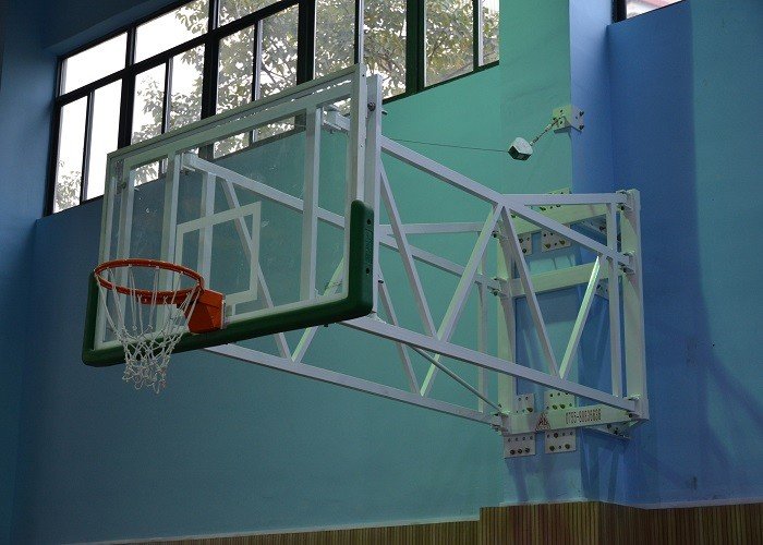 Folding Fixed Type Hydraulic Basketball Stand , Indoor Wall Mounted Basketball Systems