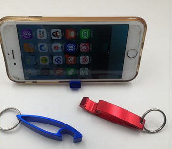 Creative bottle opener  Phone support key chain with a bottle opener