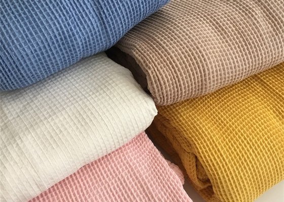 100%cotton knitted fabric popular in autumn/winter CVC waffle fabric for hotel pajamas, nightgowns and slippers supplier