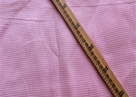 100%cotton knitted fabric popular in autumn/winter CVC waffle fabric for hotel pajamas, nightgowns and slippers supplier