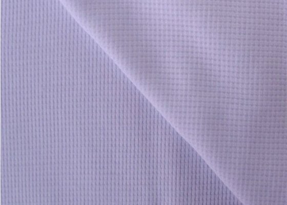 100%cotton knitted fabric popular in autumn/winter CVC waffle fabric for hotel pajamas, nightgowns and slippers supplier