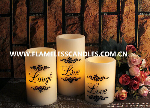 China Home Decoration Round Flameless LED Pillar Candles With Real Wax and Black Printing distributor