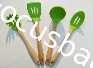 China hot sale silicone kitchen Utensils cooking tools with wood bamboo handle Nonstick Cookware supplier
