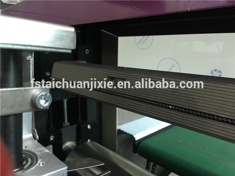 Automatic Feeding System nipple Packing Machine masks packaging machine horizontal packing machine