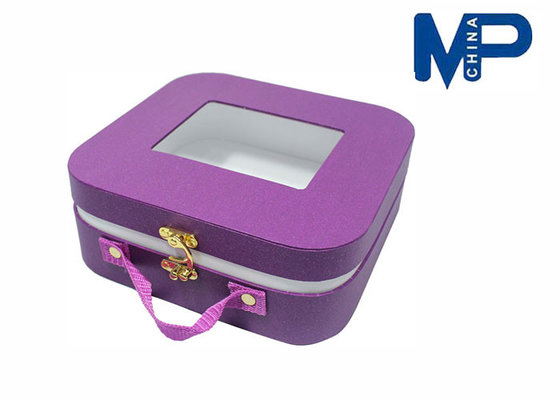Cube Fashionable suitcase storage box with silver coloured snap lock