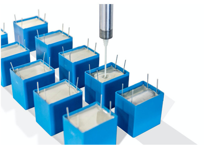 Potting e-motors and capacitors equipment ab dosing dispensing potting machine