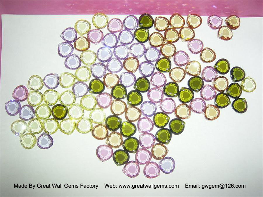 6-30mm cubic zirconia (CZ) pear (flat tables), with a hole on the end (face to face)