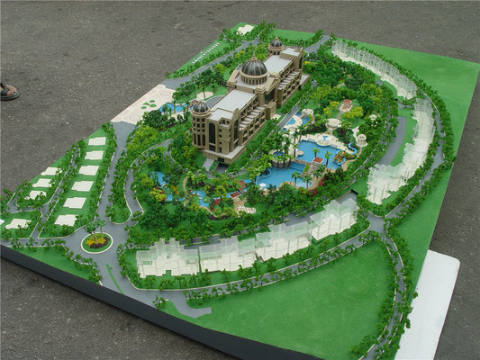 Physical scale model with warm lighting for building construction presentation