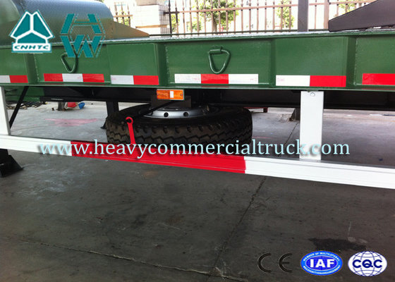 Green HOWO 4 Axles Low Bed Semi Trailer Carbon Steel Low Bed Truck