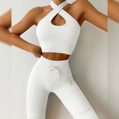 2021 summer new women's yoga suit solid color sexy suspenders crossover two pieces vest and tight trousers set