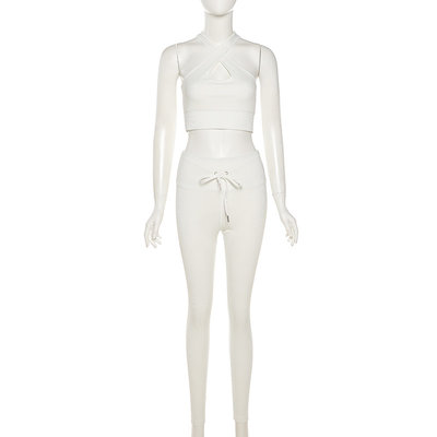 2021 summer new women's yoga suit solid color sexy suspenders crossover two pieces vest and tight trousers set