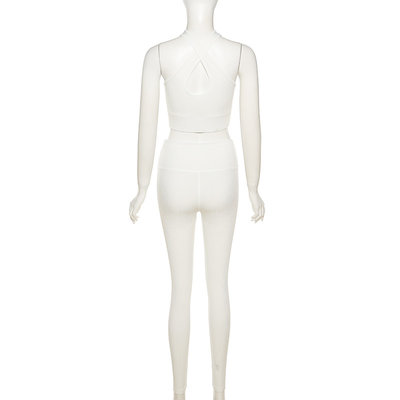 2021 summer new women's yoga suit solid color sexy suspenders crossover two pieces vest and tight trousers set