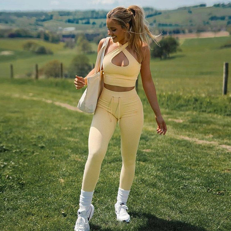 2021 summer new women's yoga suit solid color sexy suspenders crossover two pieces vest and tight trousers set