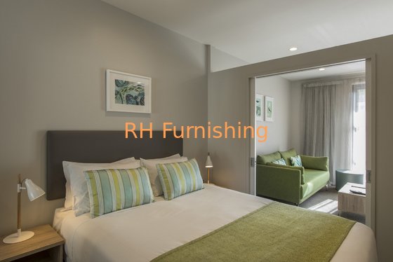 Modern hotel rooms furniture of Apartment style Upholstery headboard bed with Laminate wardrobe and long desk supplier