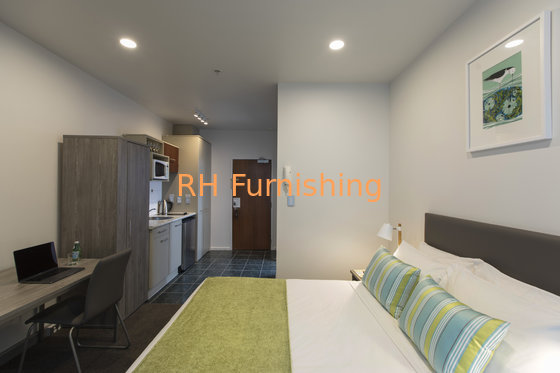 Modern hotel rooms furniture of Apartment style Upholstery headboard bed with Laminate wardrobe and long desk supplier