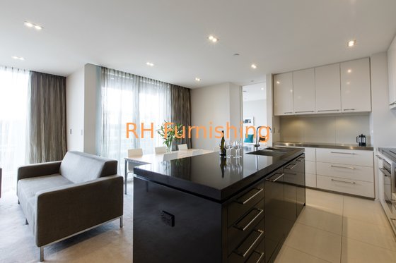 Fashion hotel style apartment usd laminate kitchen cabinets with Upholstered bed and Sofa chairs supplier