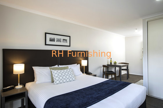 Budget hotels interior design of Leather upholstery headboard bed with Wood structure desk and tables supplier