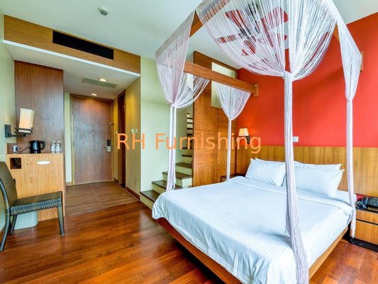 Cheap hotel bedroom furniture used Laminated headboard bed with fixed desk and Minibar cabinets supplier