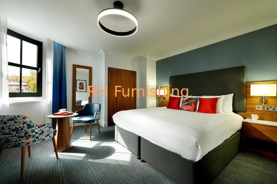 Singapore hotel interior design of Guestroom furiture Laminate wood bunk bed with fabric headboard and Drawer of chest supplier