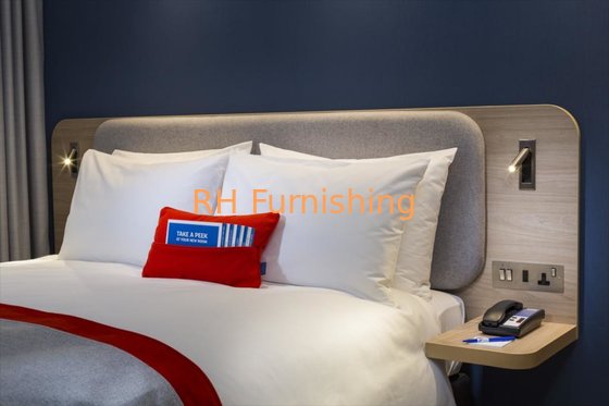 Kelantan budget hotel furniture made by China manufactuer used Laminated headboard bed with Upholstered sofa chairs supplier