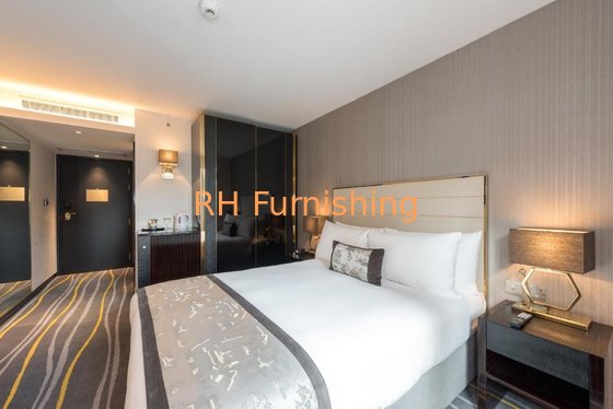 Melaka light luxury hotel room design of guestroom furniture by Stainless steel leather headboard bed with fashion table supplier