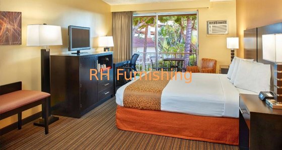 Jogja hotel interior design of guestroom furniture wood panel headboard and Drawer of TV cabinet with leisure chair supplier