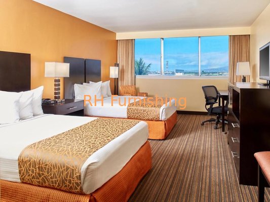 Jogja hotel interior design of guestroom furniture wood panel headboard and Drawer of TV cabinet with leisure chair supplier